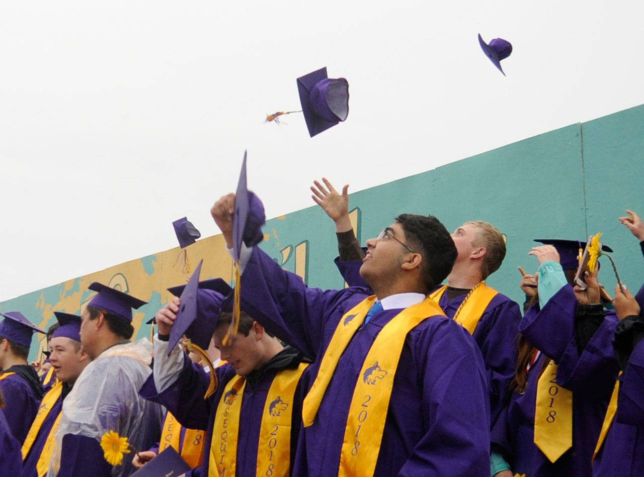 Rain does not stop smiles on this SHS grad parade | Sequim Gazette