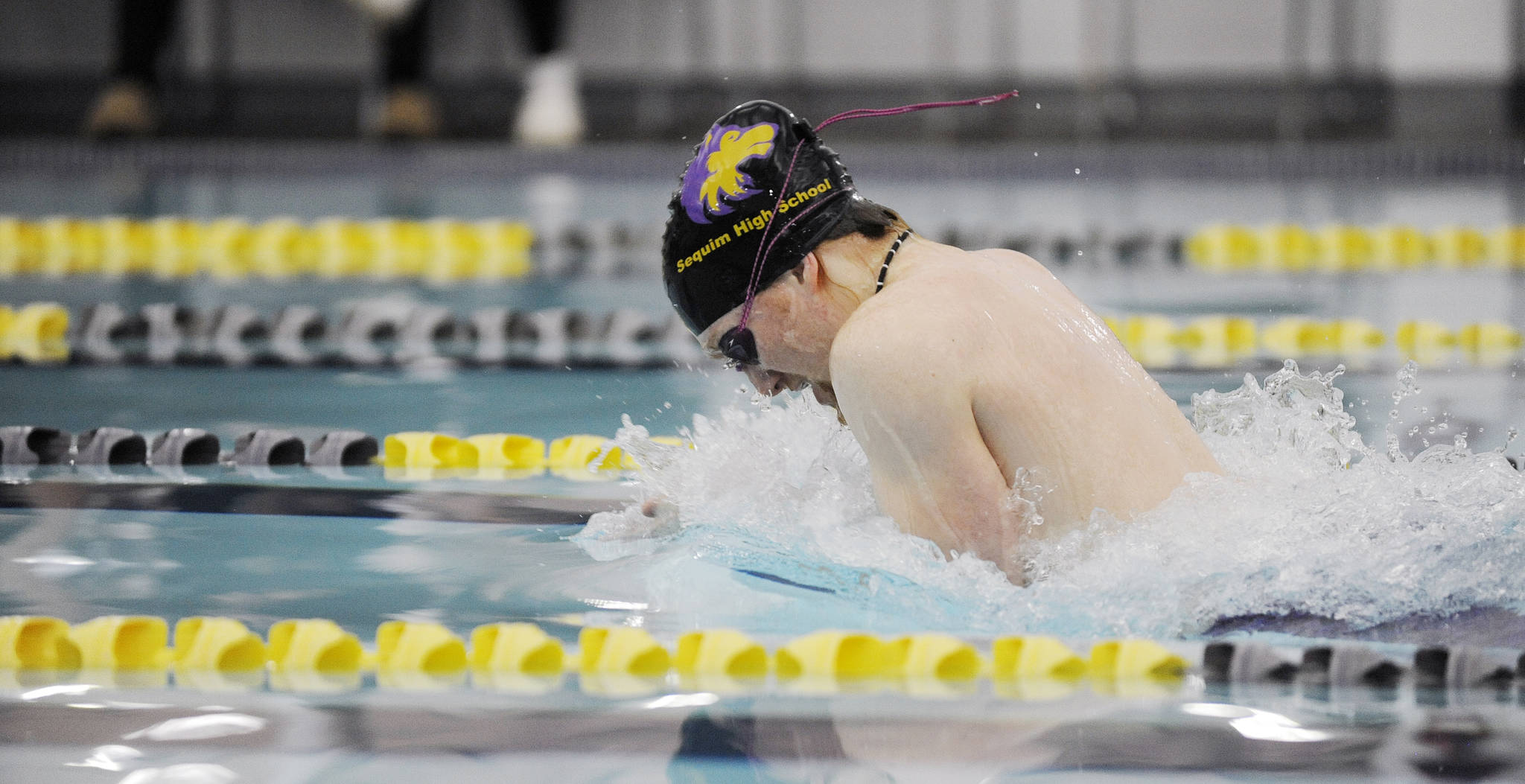 Boys swimming: Wolves splash to first win | Sequim Gazette